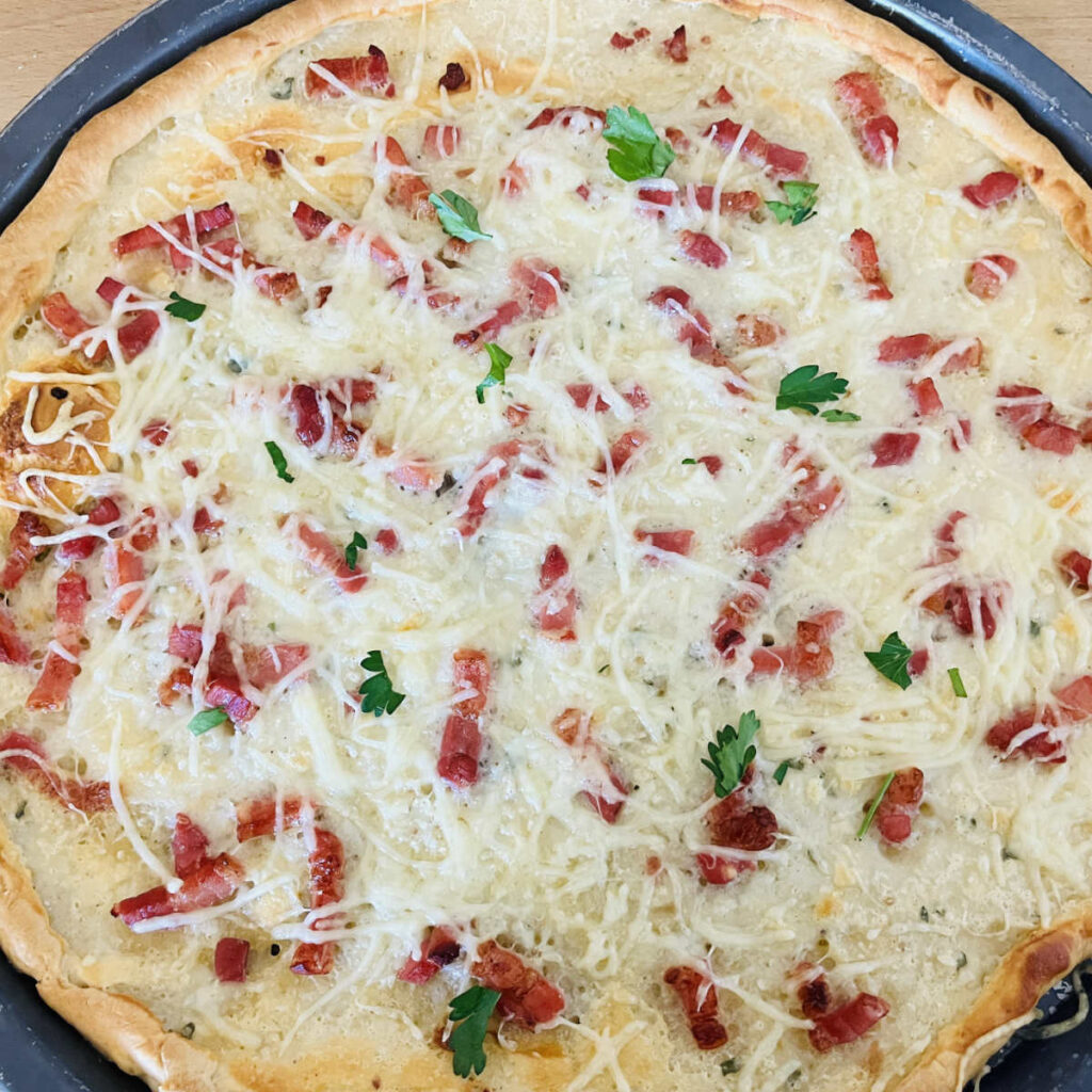 German Flammkuchen (white pizza with bacon and onions)