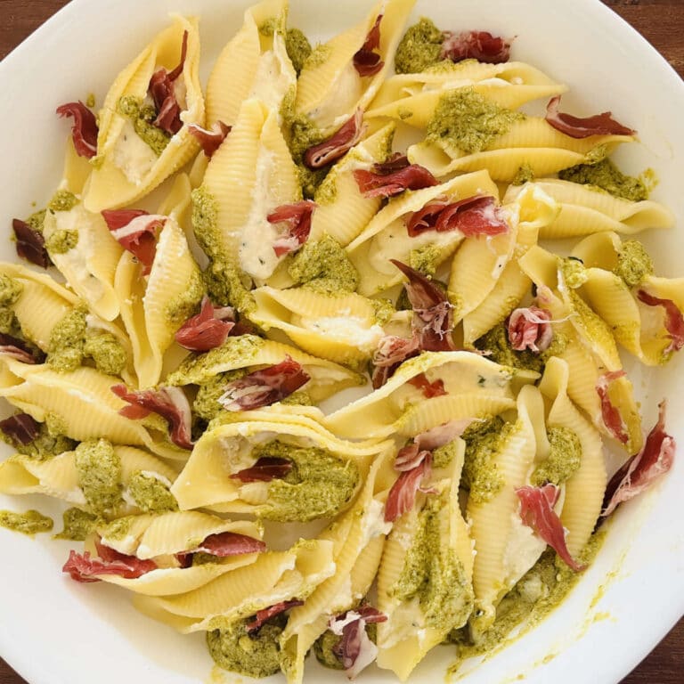 Ricotta stuffed shell pasta in pesto sauce